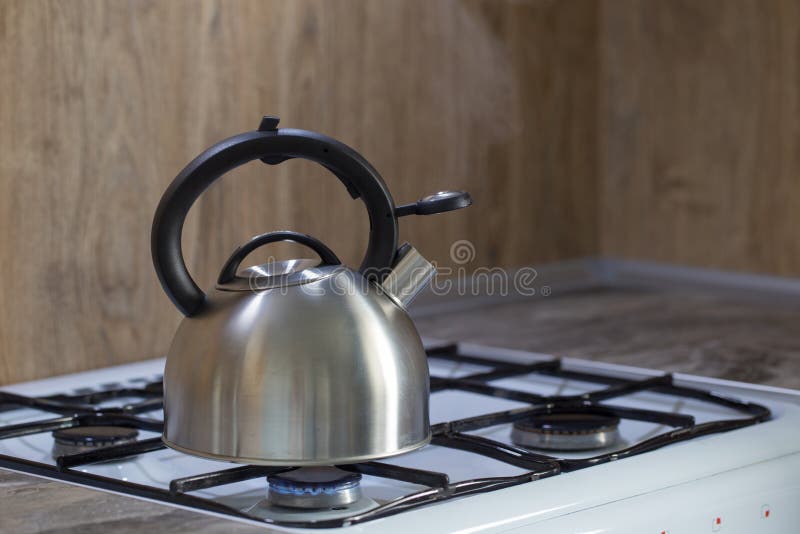Metal Silver Modern Kettle on Gas Stove in Kitchen Stock Photo - Image ...