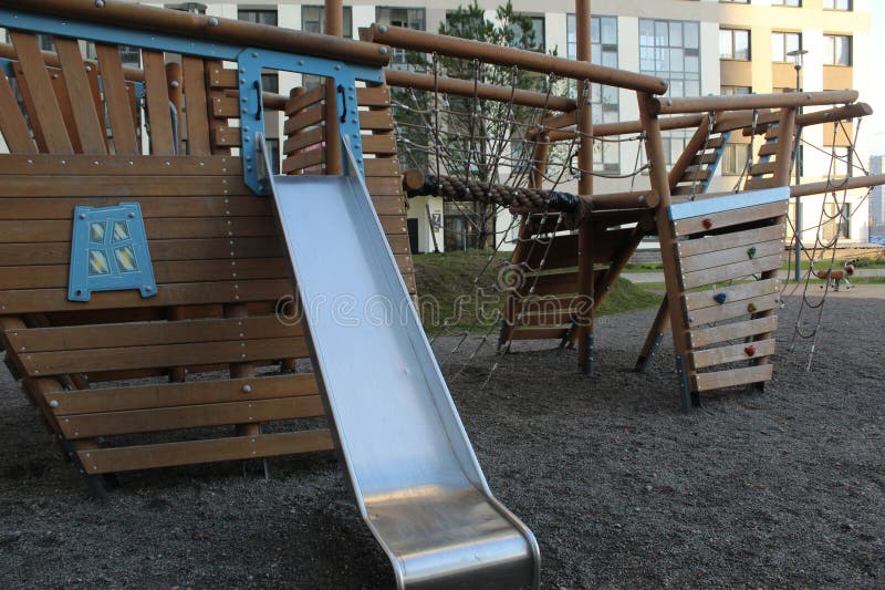 Metal Slide on the Playground. Modern Courtyard Stock Image - Image of ...