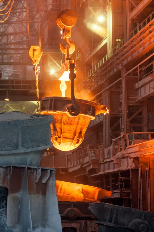 Metal smelting casting stock photo. Image of cast, radiant - 220878948
