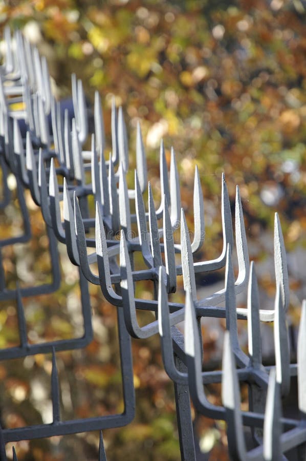 Metal Spikes with Autumn Background 01 Stock Image - Image of autumn ...