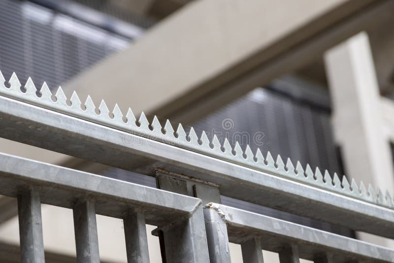 Metal Spikes on a Strut Above a Gate Stock Image - Image of abstract ...