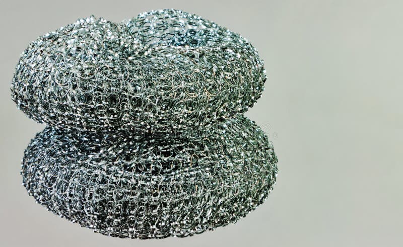 Metal Sponge for Washing Dishes on a Gray Background Stock Image ...