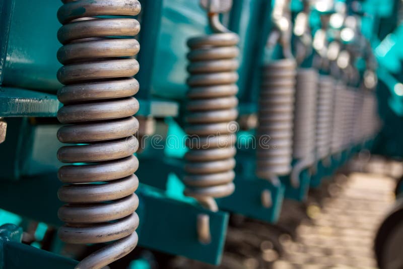 Metal Springs Standing in a Row on the Soil-processing Unit Stock Photo ...
