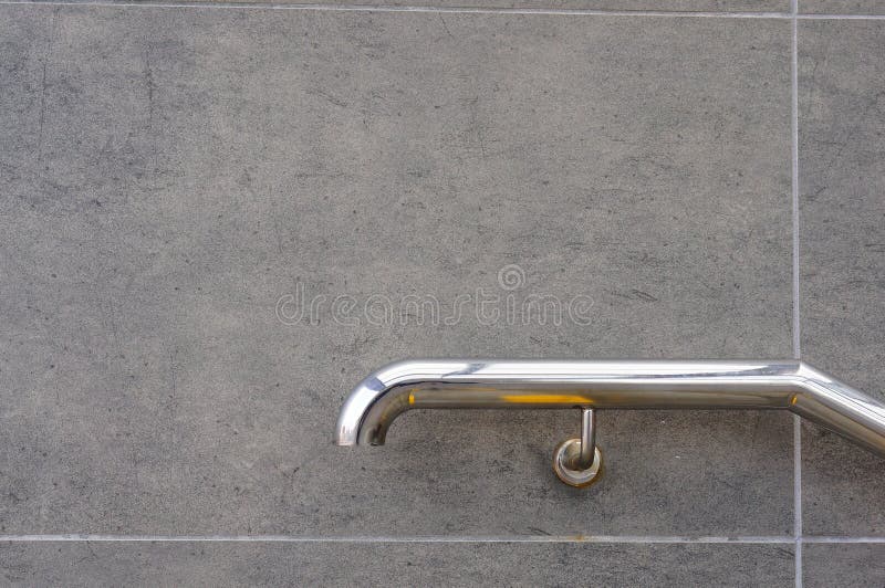 Metal Stair Handle Attached To a Wall Stock Photo - Image of doorway ...
