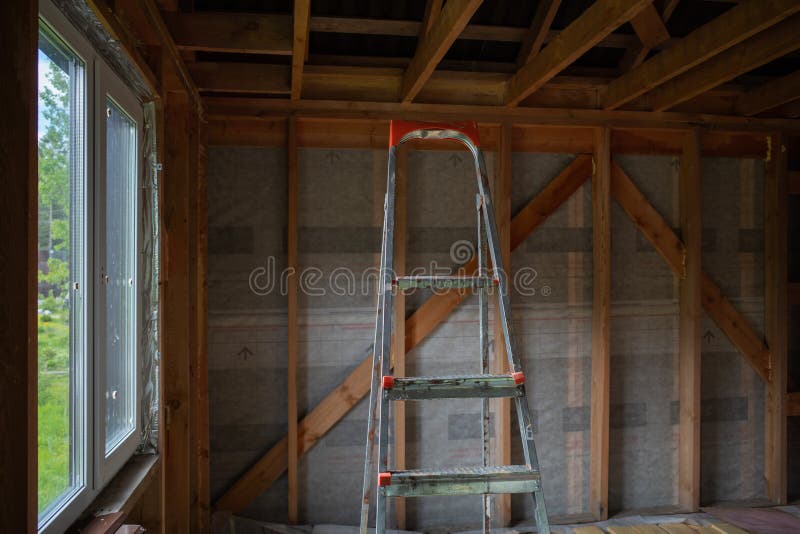 A Metal Staircase Inside a Frame House Under Construction. the Concept ...
