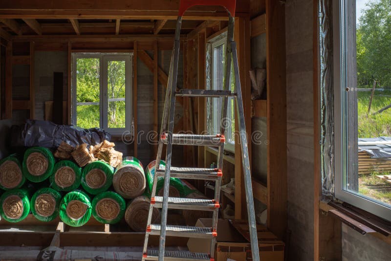 A Metal Staircase Inside a Frame House Under Construction. the Concept ...