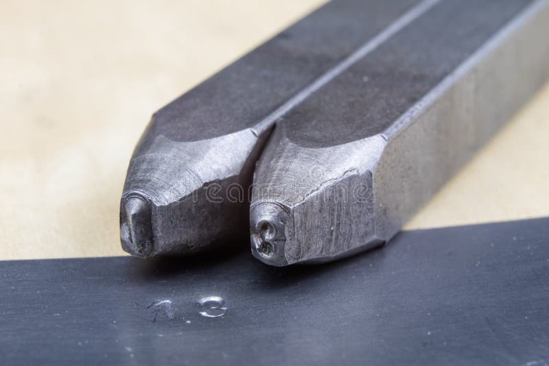 Metal Stamps for Stamping Numbers and Letters in Metal. Embossed Stock ...