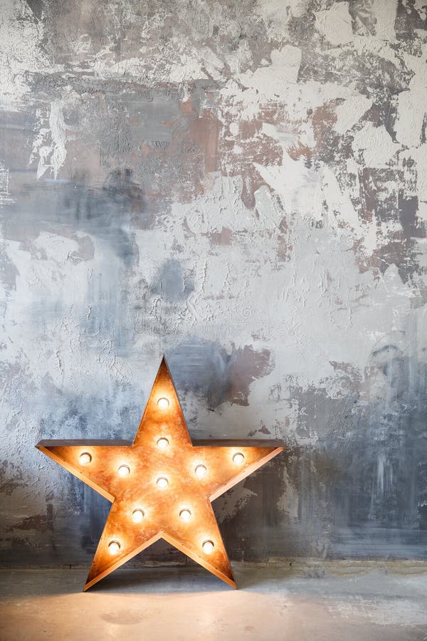 Metal star with lamps stock photo. Image of apartment - 92409014