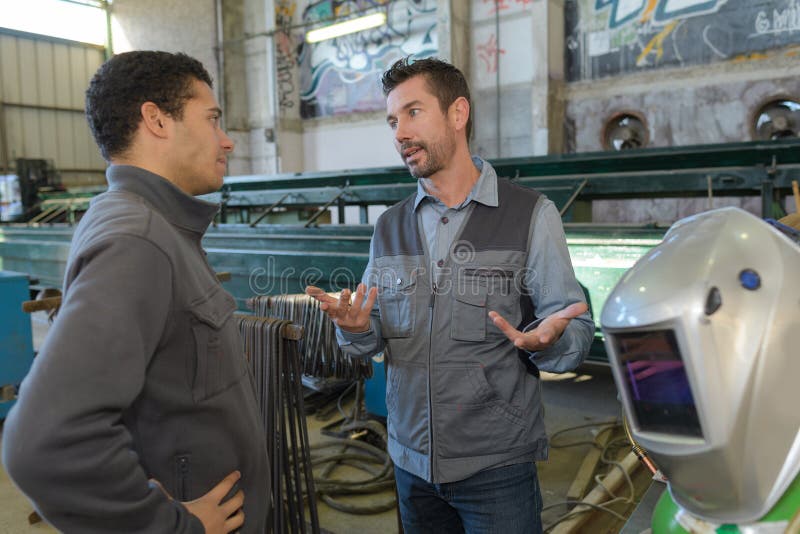 Metal and Steel Factory Worker Stock Photo - Image of light, soldering ...