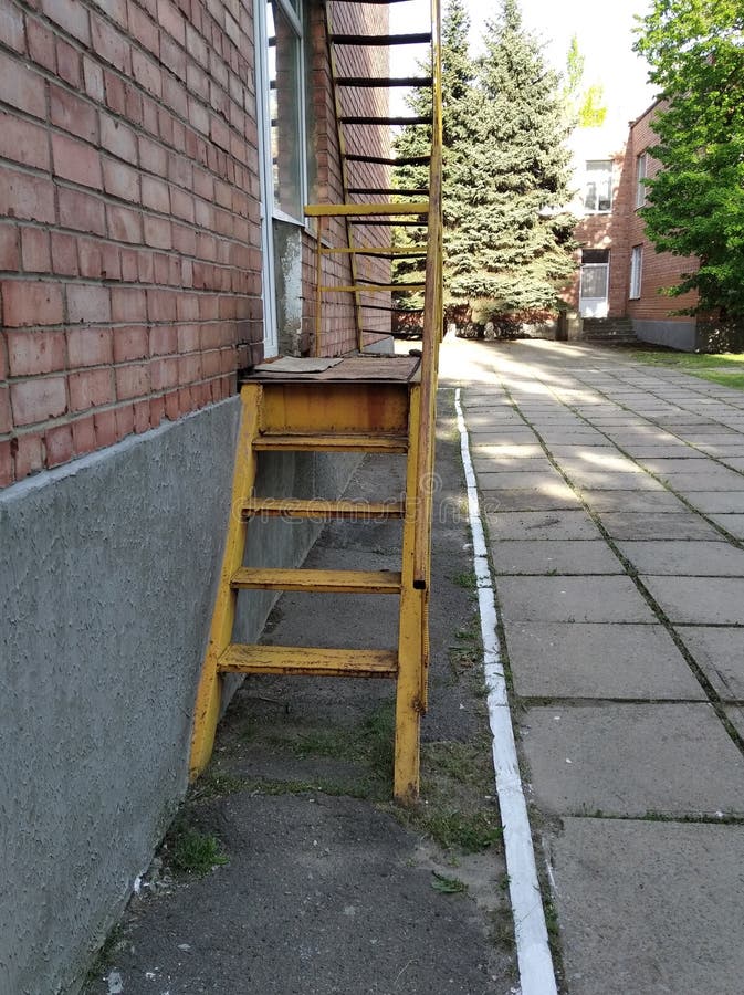 Metal Steps Painted Yellow Running To Balcony Stock Image - Image of ...
