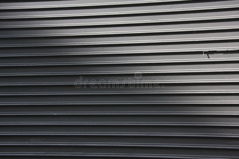 Metal store shutters stock image. Image of curtain, trade - 53001537