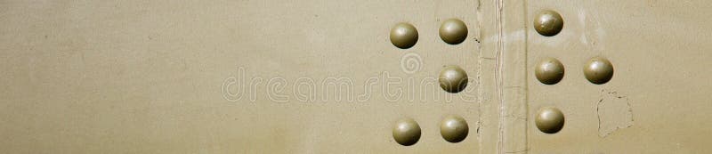 Metal strip with rivets stock photo. Image of engraving - 29455360