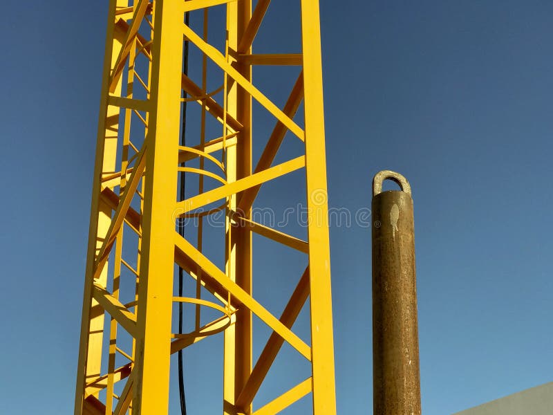 Metal Construction Site Jib Crane with Pallet Carrier and Blue Sky in ...