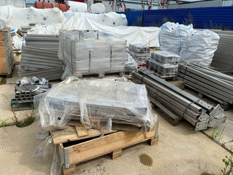 Metal Structures for Construction and Pipes on Pallets in an Open-air ...