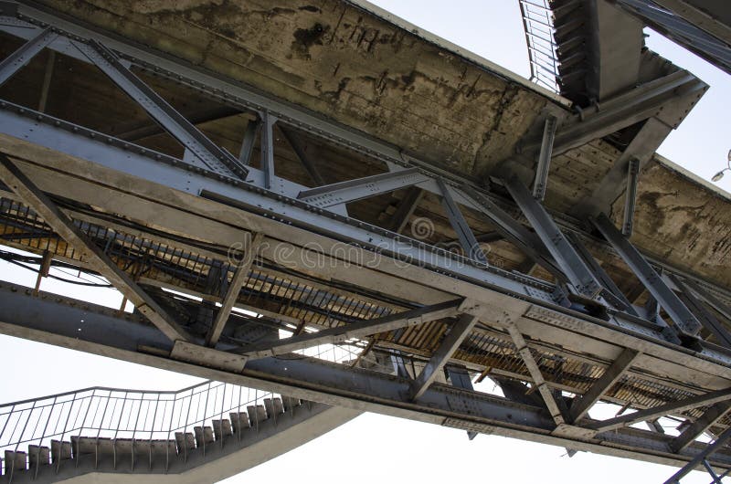 Metal Structures Under the Bridge, Large Metal Bridge Over Water. View ...