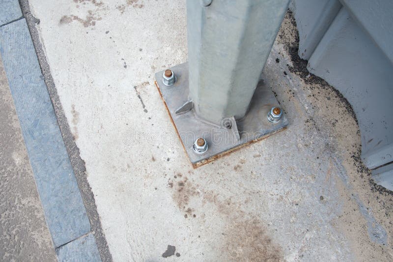 The Metal Support is Attached To the Concrete Base with Anchor Bolts ...