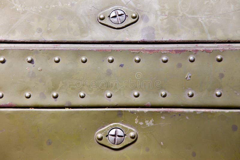 Metal surface with rivets stock photo. Image of obsolete - 27368894