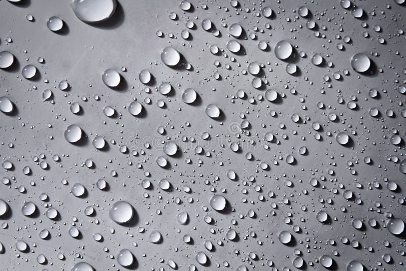 Metal surface water drops stock image. Image of water - 143354523
