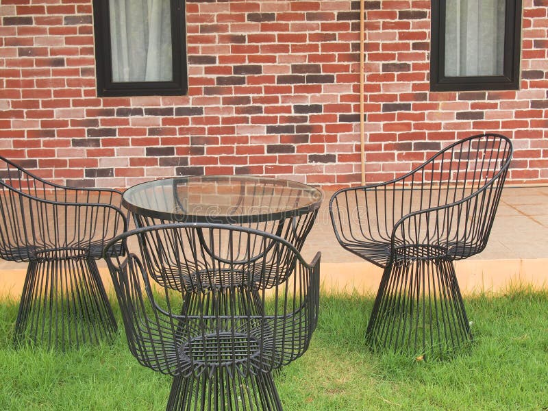 Metal table and chairs stock image. Image of leisure - 166438611