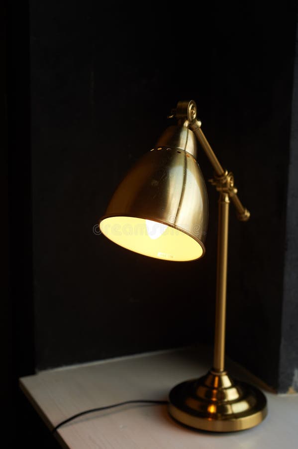 Metal Table Lamp of Gold Color.with Warm Temperature Lamp Stock Image ...