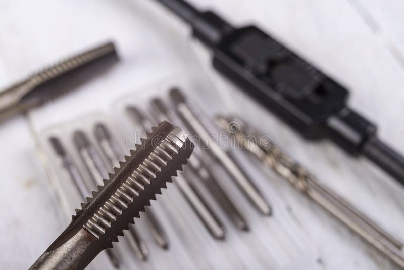 Metal Taps Prepared for Work. Accessories in the Locksmith S Workshop ...
