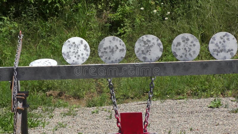 Metal Target at a Shooting Range Being Hit. Stock Video - Video of ...