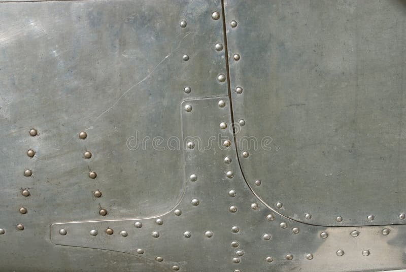 Rivets on aircraft skin stock image. Image of grey, joining - 33855063