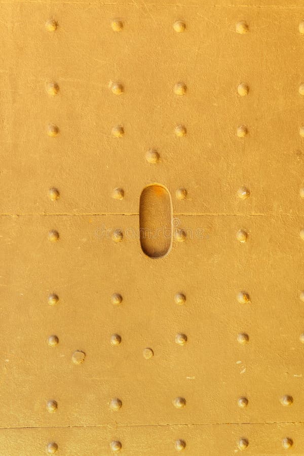 Metal Texture with Rows of Rivets Painted Yellow. Bright and Light Back ...
