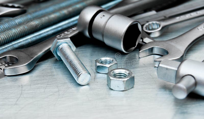 Metal Tools and Fixing Elements on the Scratched Stock Photo - Image of ...