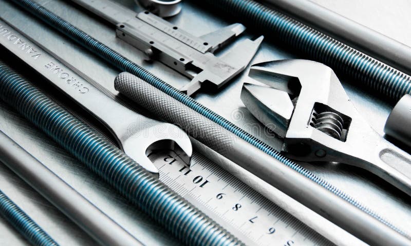Metal Tools on the Scratched Metal Background Stock Image - Image of ...