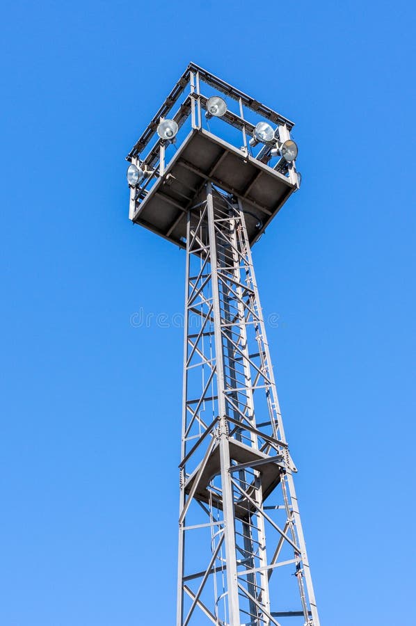 Metal Tower with Lights Industry Object in the Blue Sky Vertical Stock ...