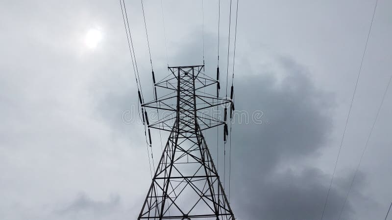 Metal Tower with Power or Electrical Lines and Clouds Stock Image ...