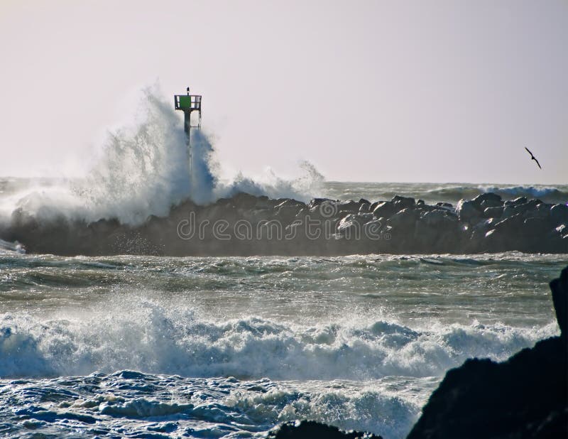 Metal Tower Rock Jetty Crashing Wave Stock Photo - Image of jetty ...