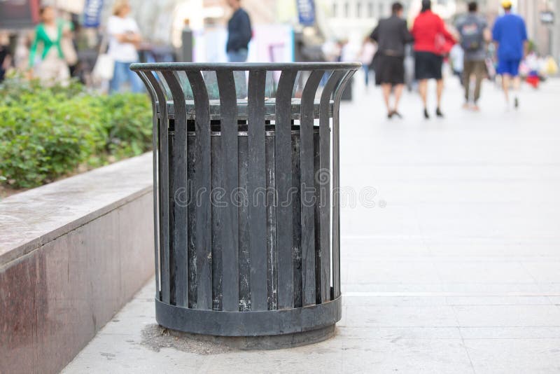 Metal trash bin in a city stock photo. Image of recycling - 259413292