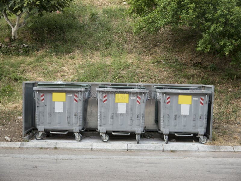Metal Trash Containers on Road Side Front View Stock Image - Image of ...