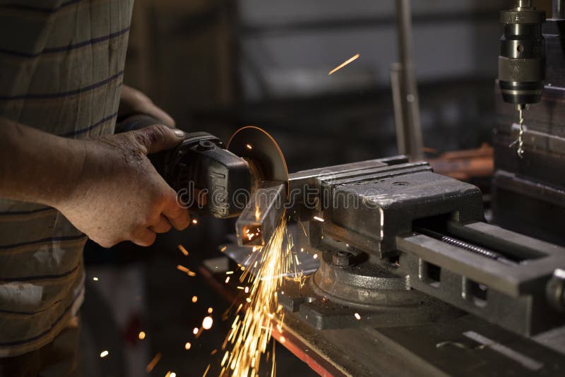 Metal Treatment. Grinding of Steel. Sparks from Disk Stock Photo ...