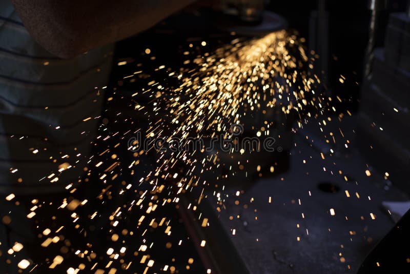 Metal Treatment. Grinding of Steel. Sparks from Disk Stock Photo ...