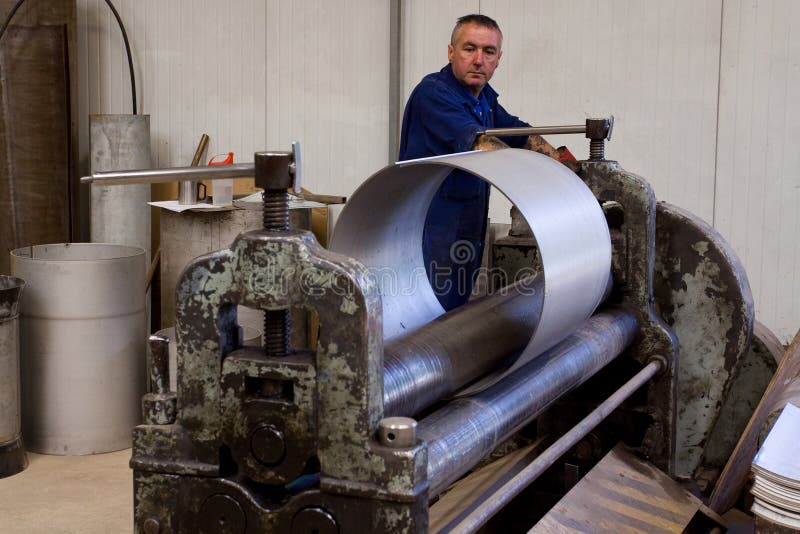 Metal tube fabrication stock image. Image of rolling, labour - 9928805