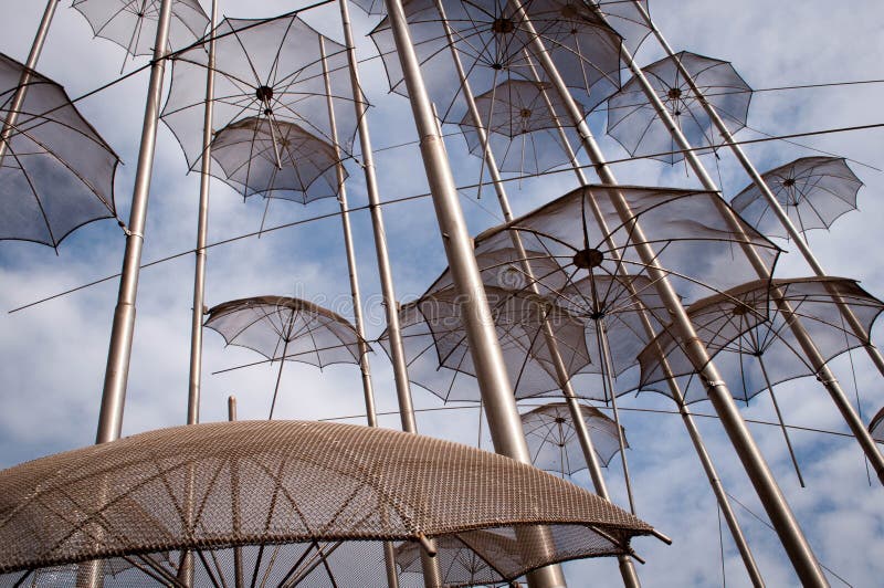 Metal umbrellas editorial stock image. Image of umbrella - 70655434