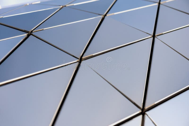 Metal wall of triangles stock image. Image of construction - 183261999