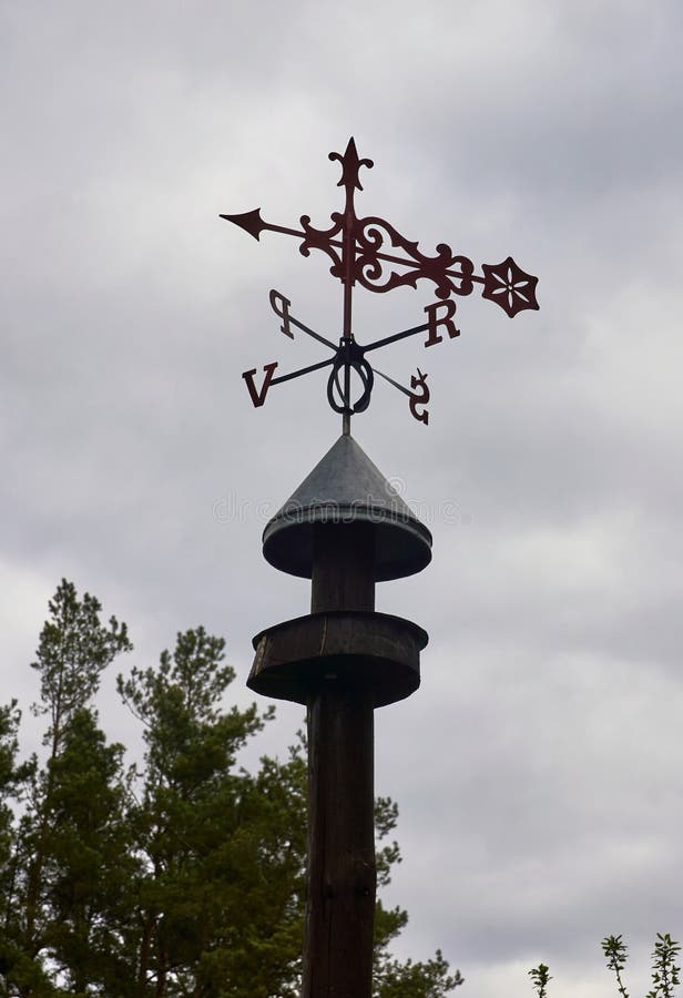 Metal weather vane stock image. Image of landmark, light - 379942055