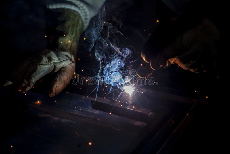 Metal Welding. Heat. the Work of a Welder in a Workshop Stock Image ...