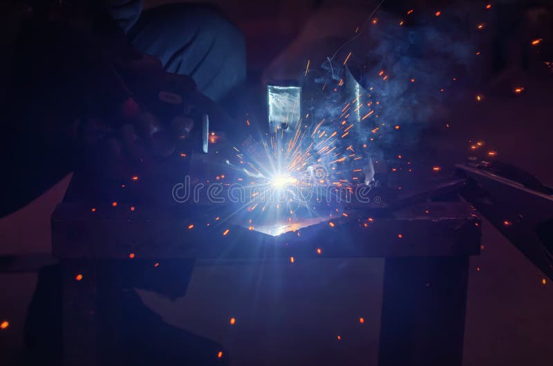 Metal Welding in Metal Workshop. Clear Light, Blue Tinting Stock Photo ...