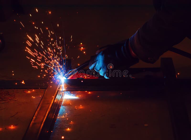 Metal Welding in Metal Workshop. Clear Light, Blue Tinting Stock Photo ...