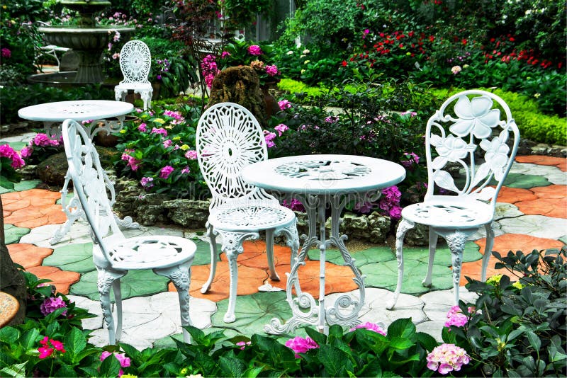 Metal White Table and Chairs with Flowers Pattern Style in Public Park ...