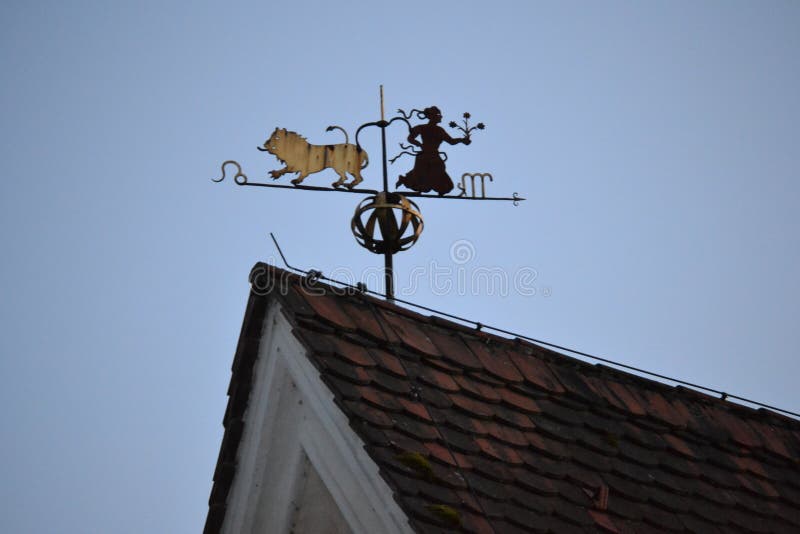 Metal Wind Indicator on a Roof in Bavaria Stock Photo - Image of blue ...