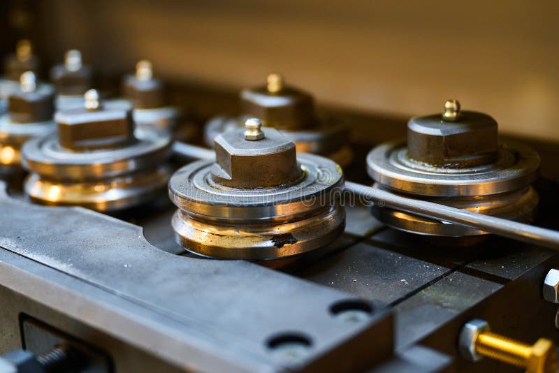 Metal Wire Pulled Out through Machine Tool Rollers at Plant Stock Image ...