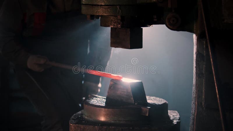 Blacksmith Shaping Hot Metal with Power Hammer Stock Video - Video of ...