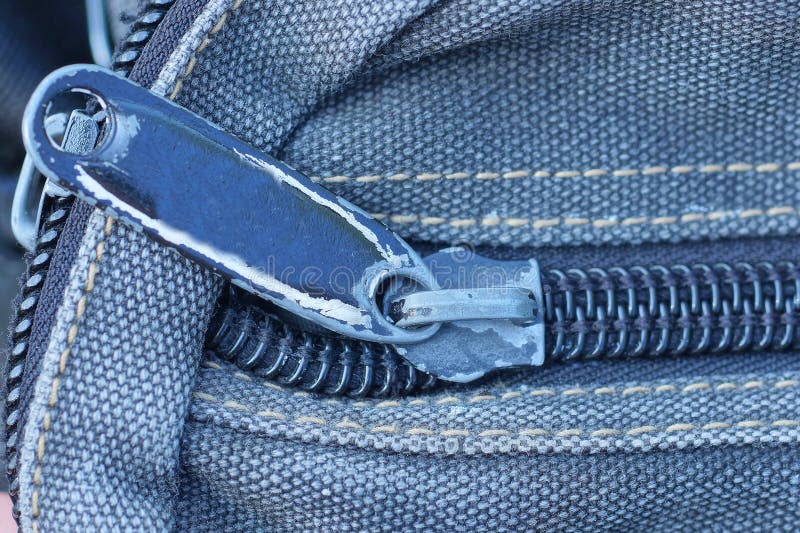 Metal Zip on the Gray Fabric of a Large Backpack Stock Photo - Image of ...