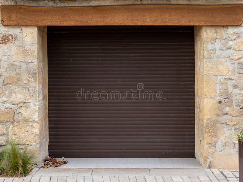 Metallic Brown Roller Shutter Curtain of Facade Store Closed Garage ...